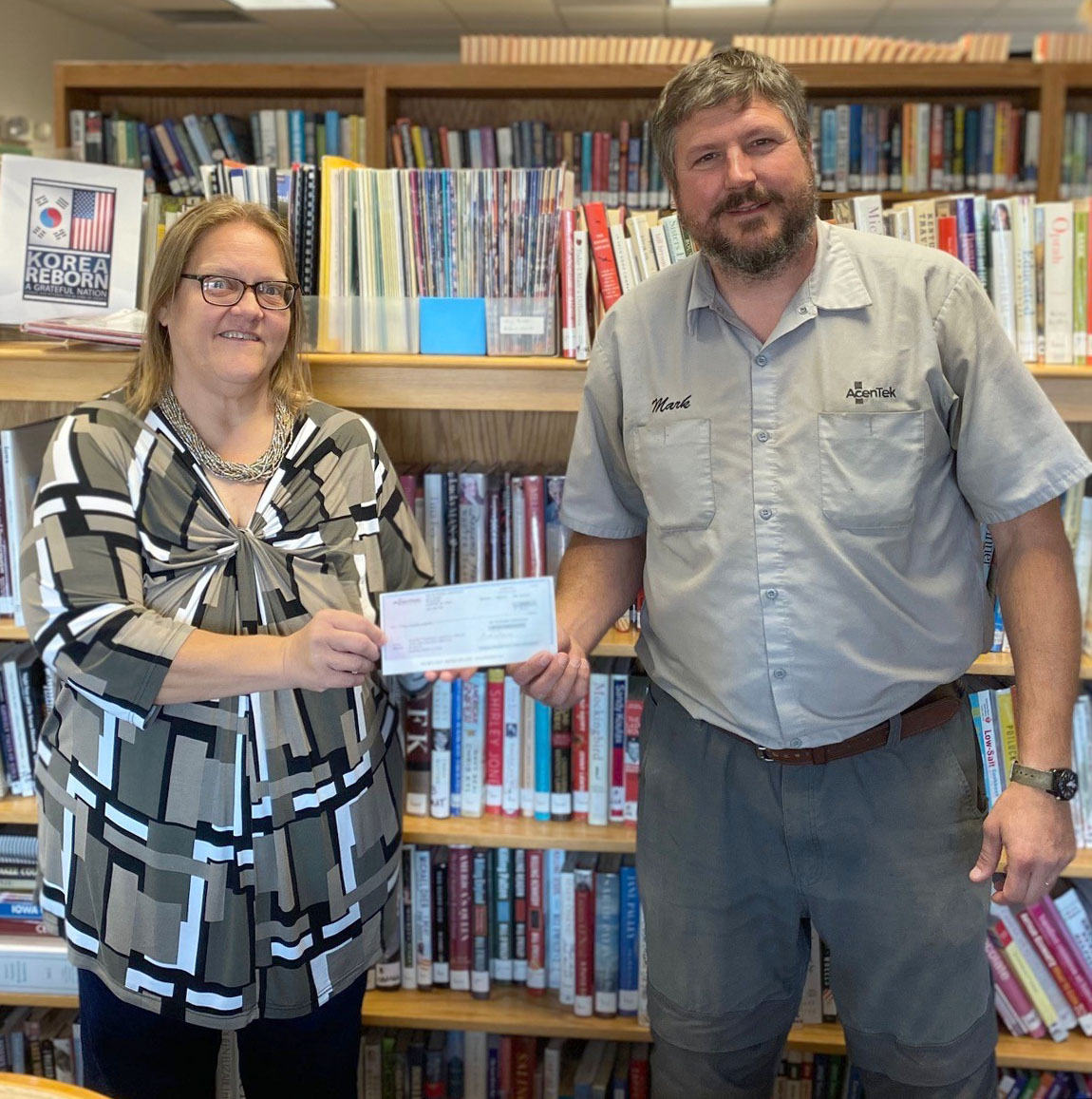 Staff Donates to 6 Iowa Libraries - Acentek