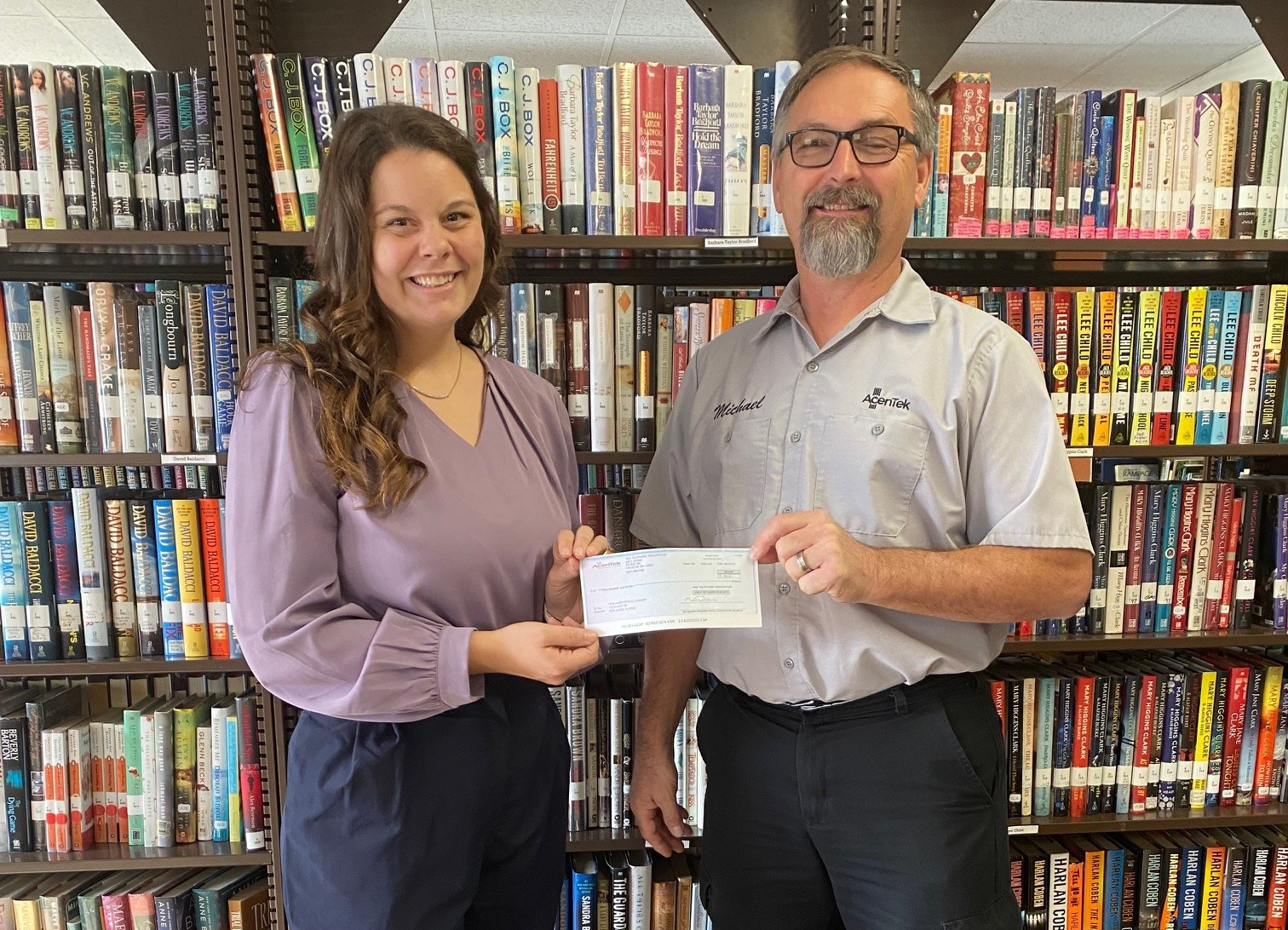 Staff Donates to 6 Iowa Libraries - Acentek